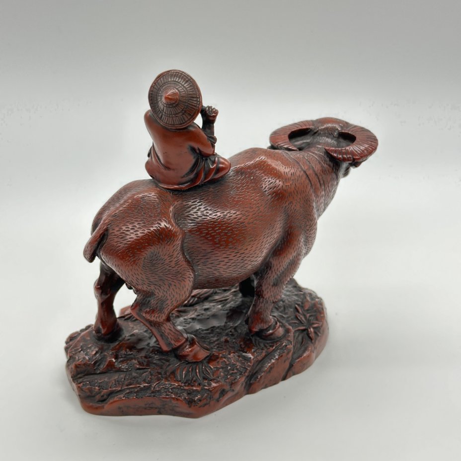 Статуэтка Мальчик на быке композитный материал Китай 1970 2000 гг стоимостью 5000 руб